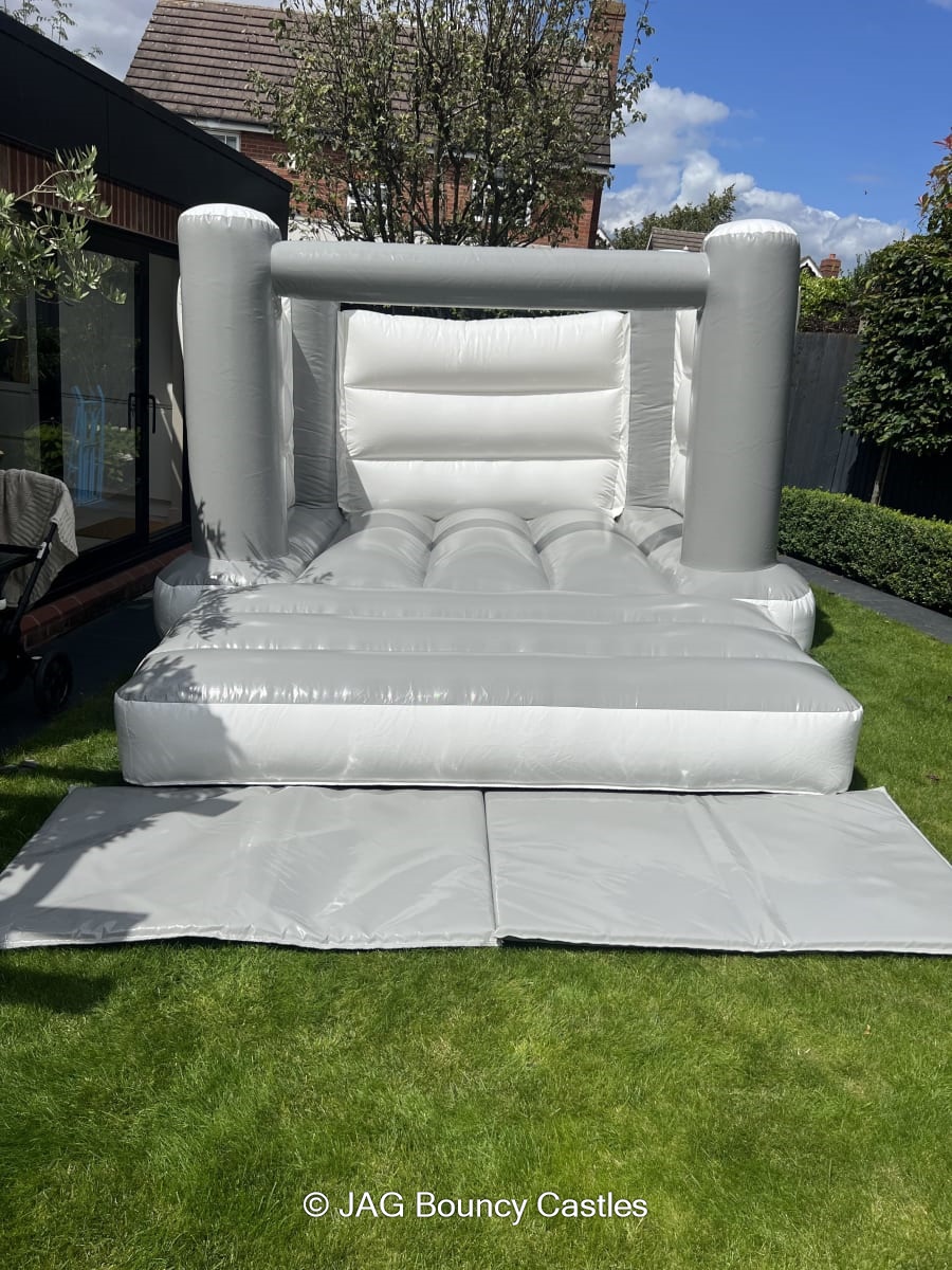 All white one of a kind Bouncy castle